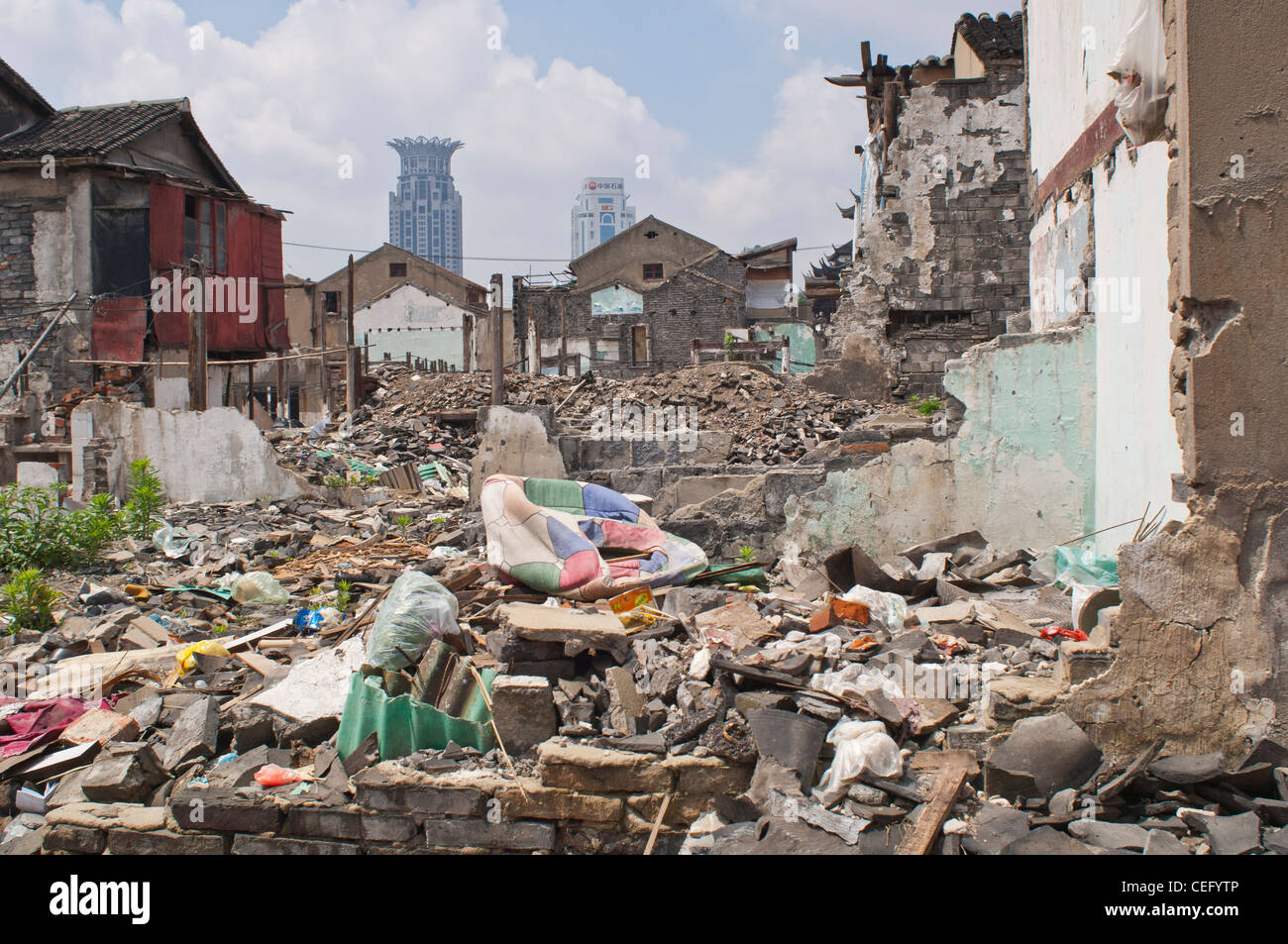 Demolition area in Shanghai with lots of bricks and waste laying around ...