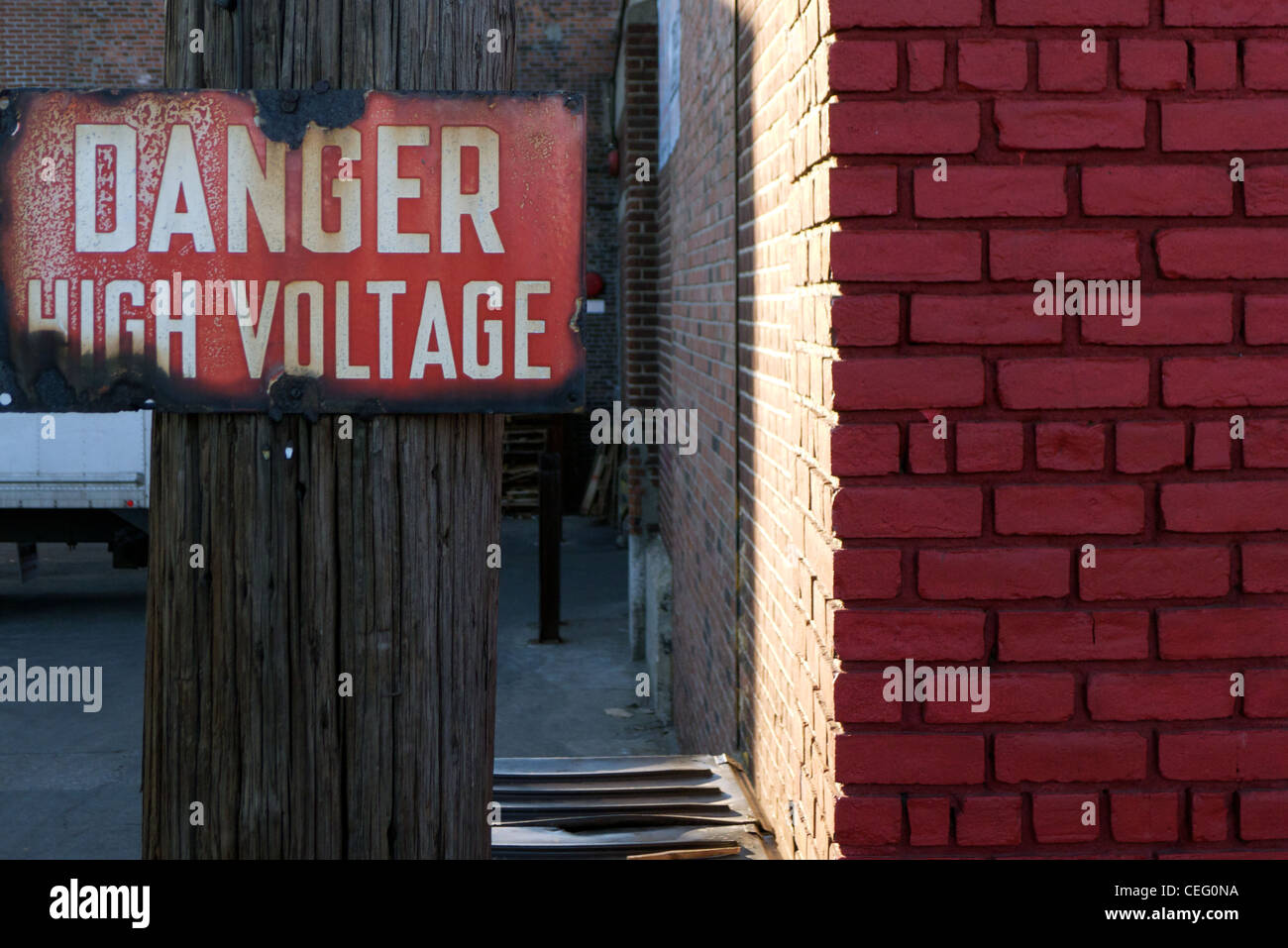 Rusty old "Danger: High Voltage" sign on a utility pole, Brooklyn, New ...