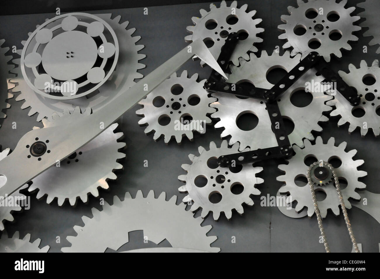 Big mechanical components shown on the wall Stock Photo - Alamy