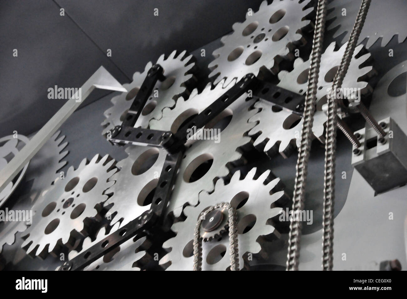 Big mechanical components shown on the wall Stock Photo - Alamy