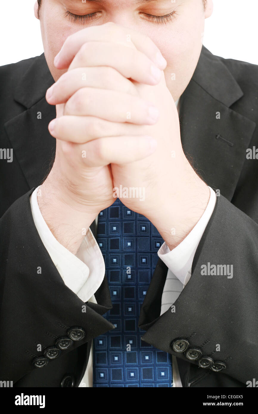 portrait of businessman praying for success Stock Photo - Alamy