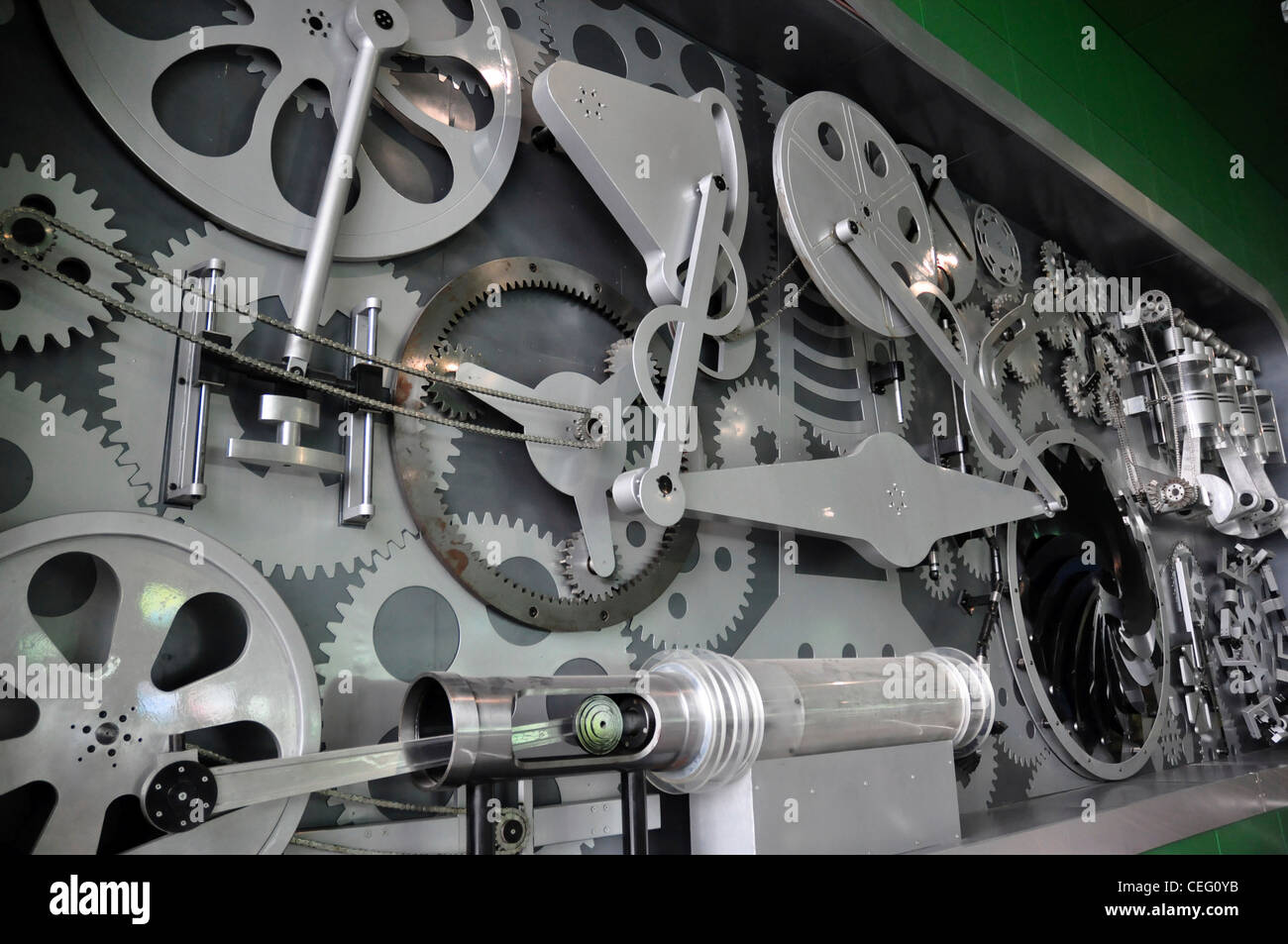 Big mechanical components shown on the wall Stock Photo - Alamy