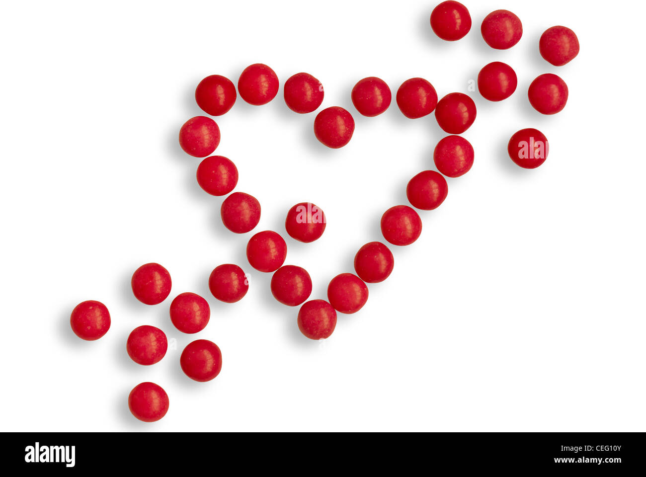 Candy's heart and arrow Stock Photo - Alamy