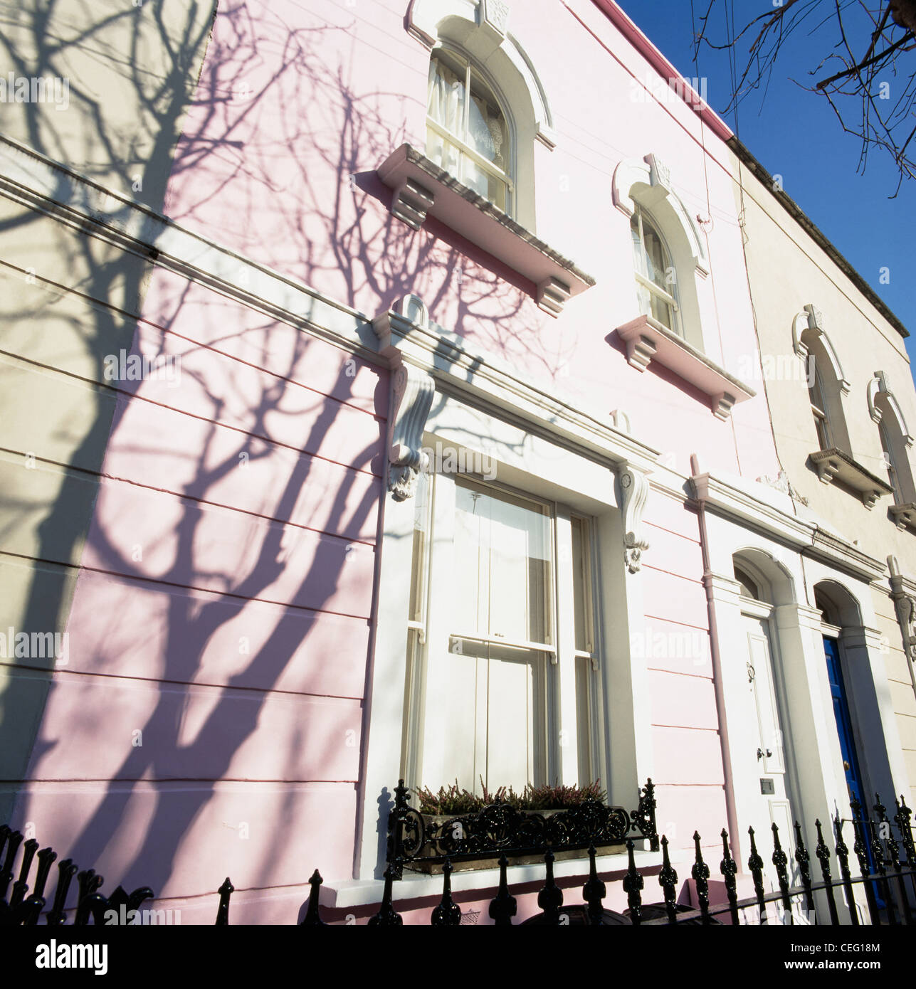 Pale pink house in Victorian terrace in North London Stock Photo - Alamy