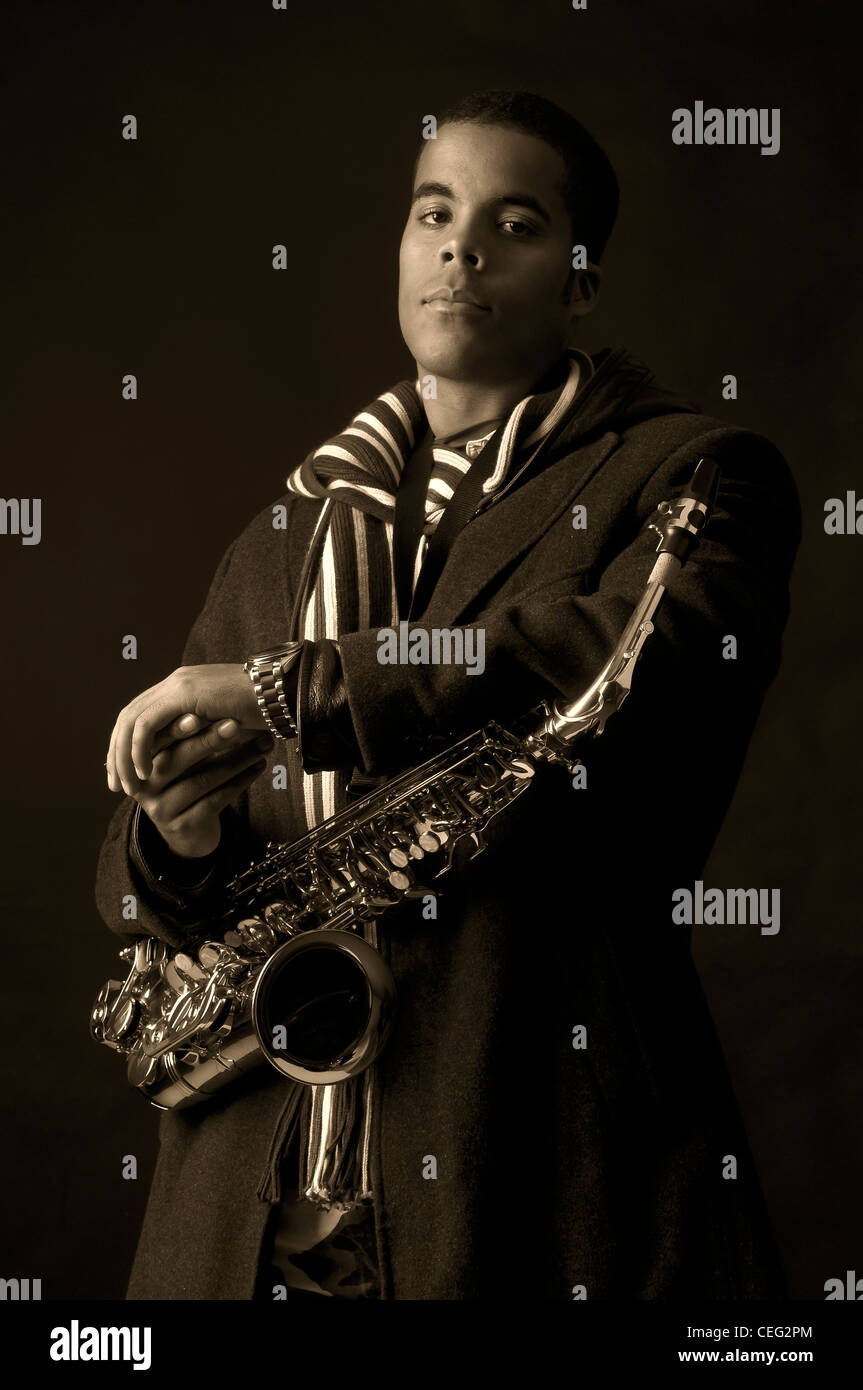 Stylish man playing the saxophone Stock Photo - Alamy