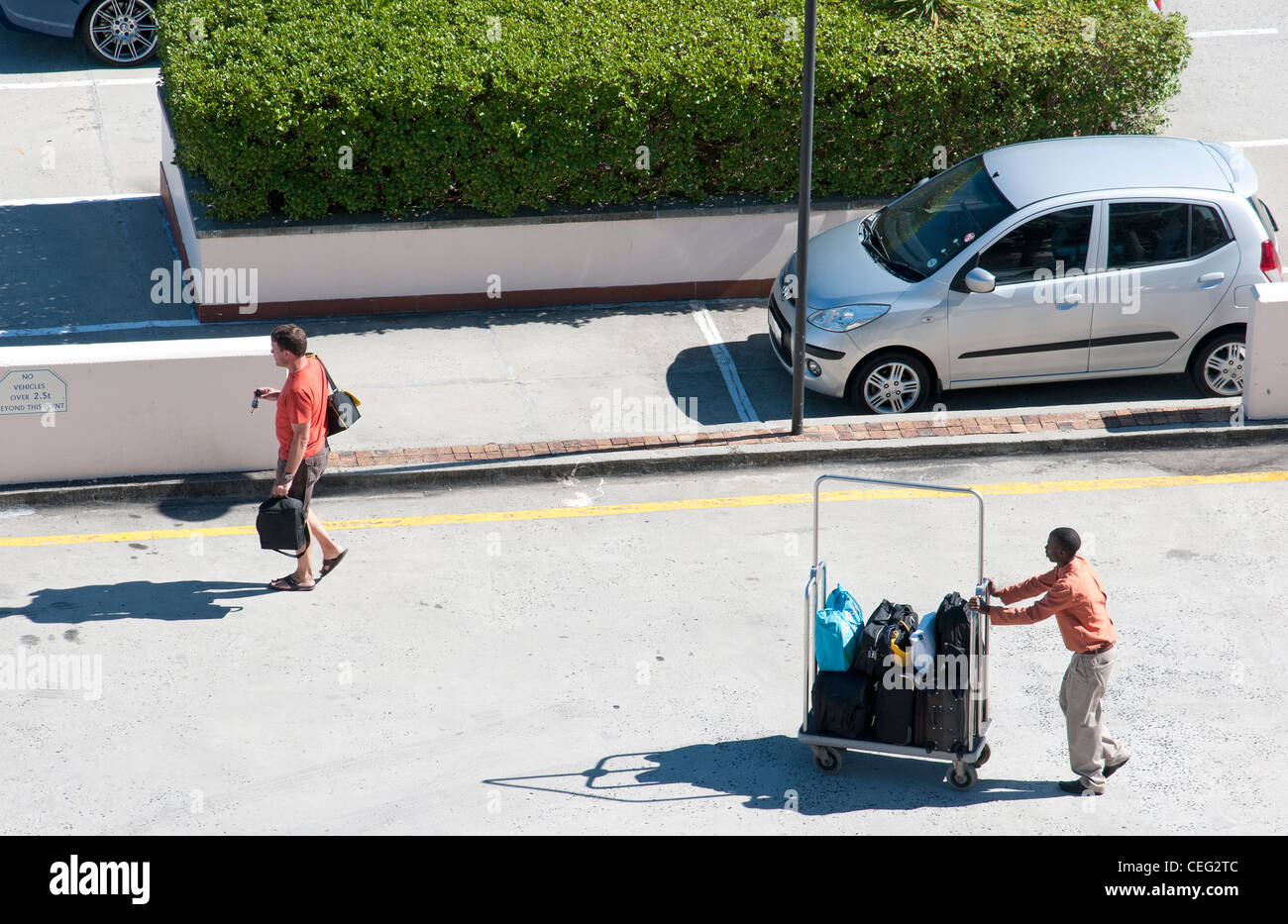 Porter with trolley hi-res stock photography and images - Alamy