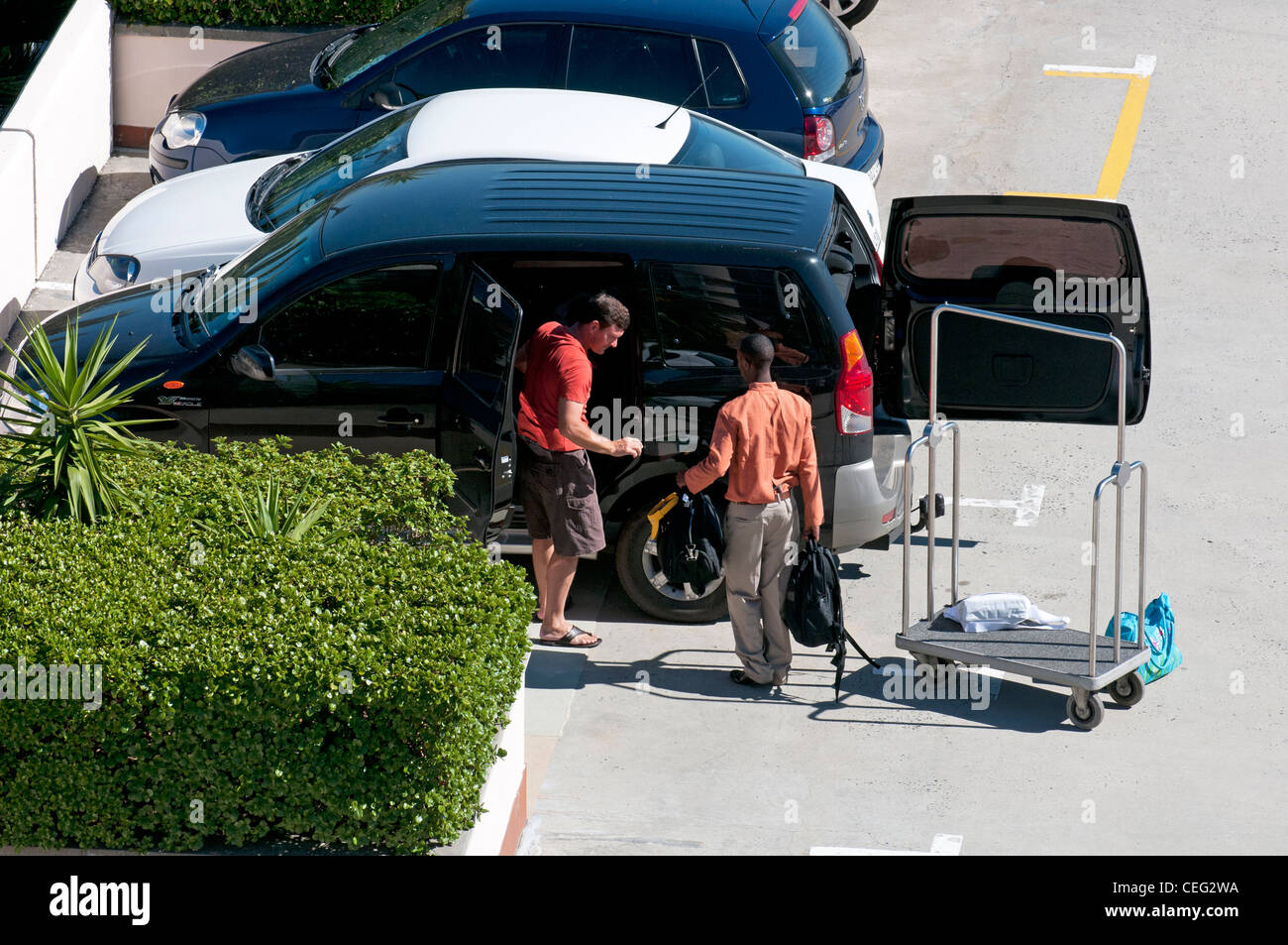 Luggage porter trolley hi-res stock photography and images - Alamy