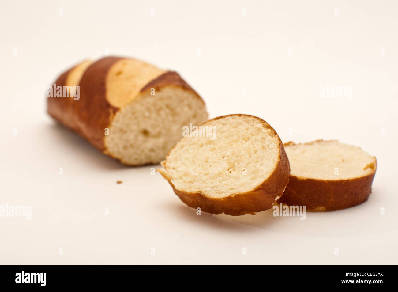Sliced lye stick, bavarian bread over a white background Stock Photo ...