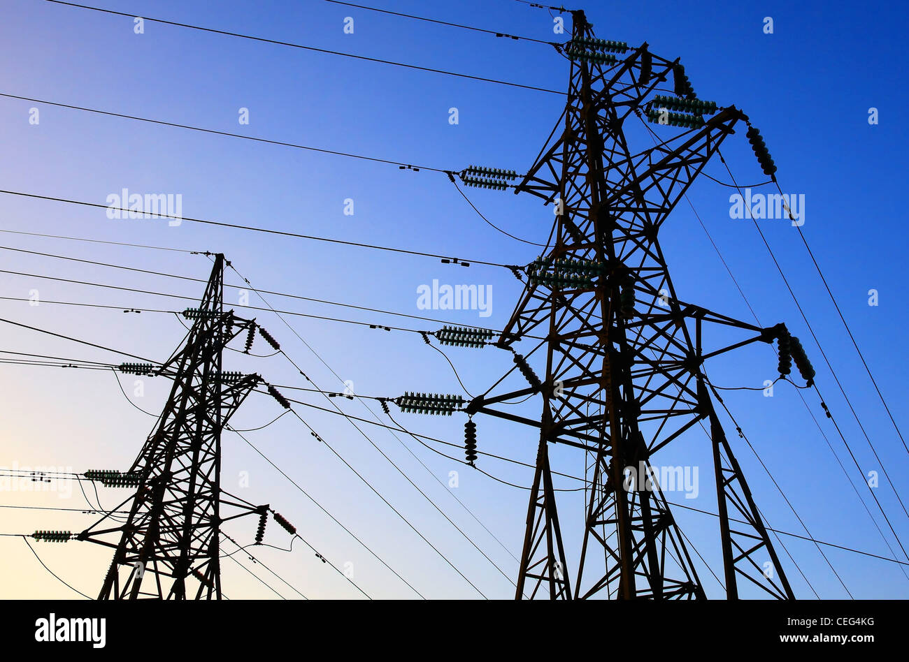 Part of the two electricity pylons. Twilight Stock Photo - Alamy
