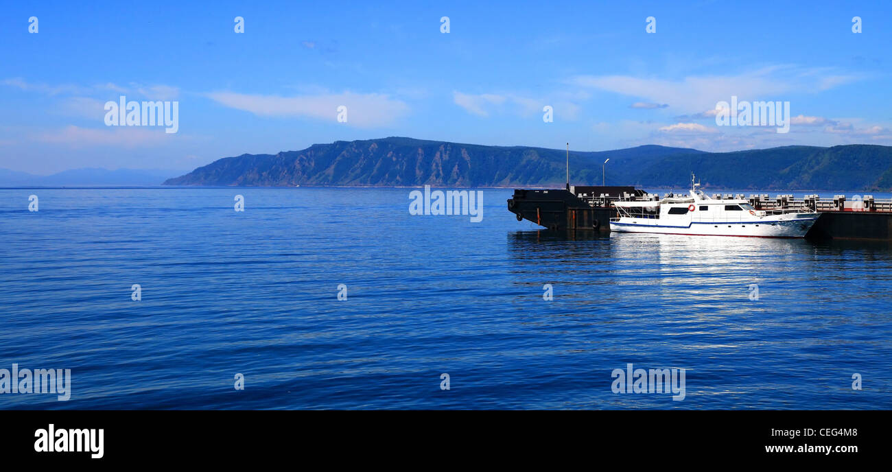 Boat. Lake Baikal. Mountains on horizon. Summer Stock Photo - Alamy