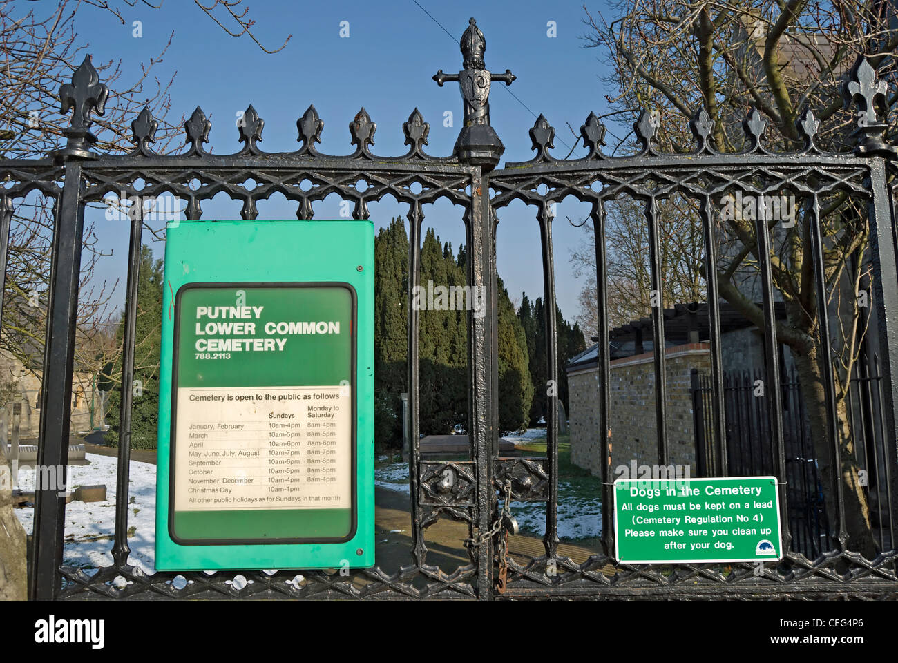 noticeboard with opening times at putney lower common cemetery ...