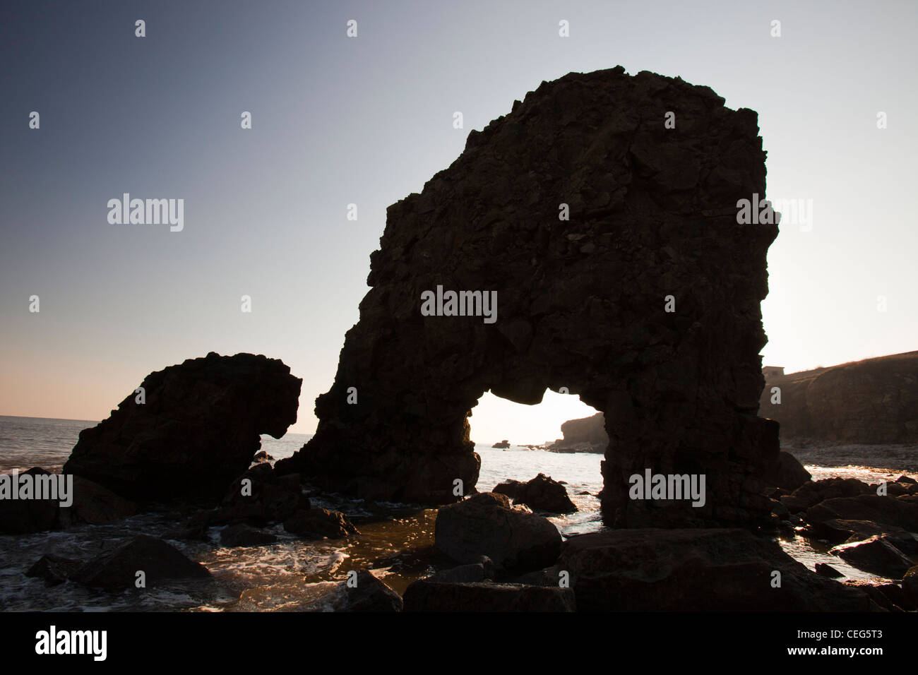 Sea stacks and sea arch on the North East coast at Whitburn between ...