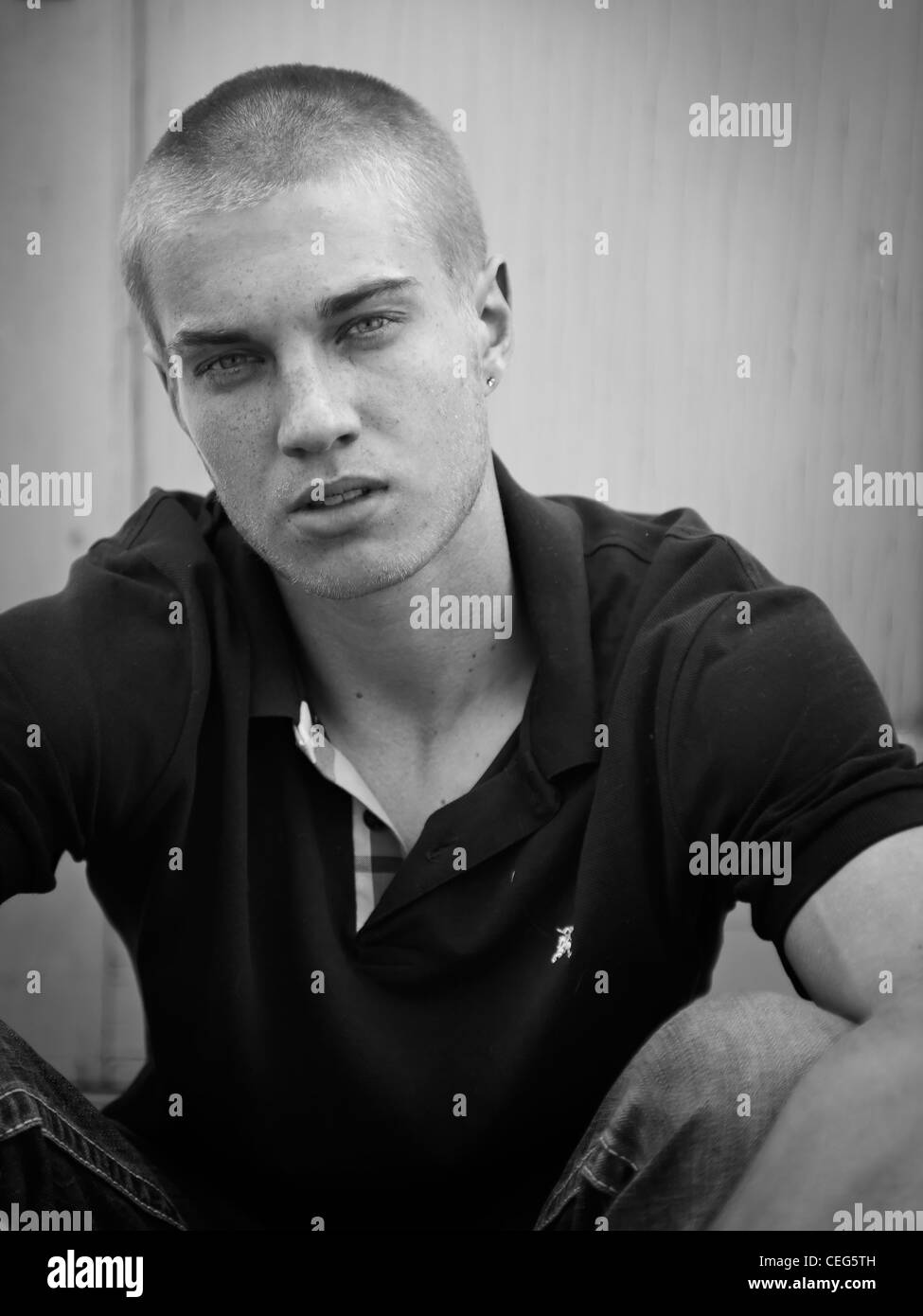 young man looking at viewer Stock Photo - Alamy