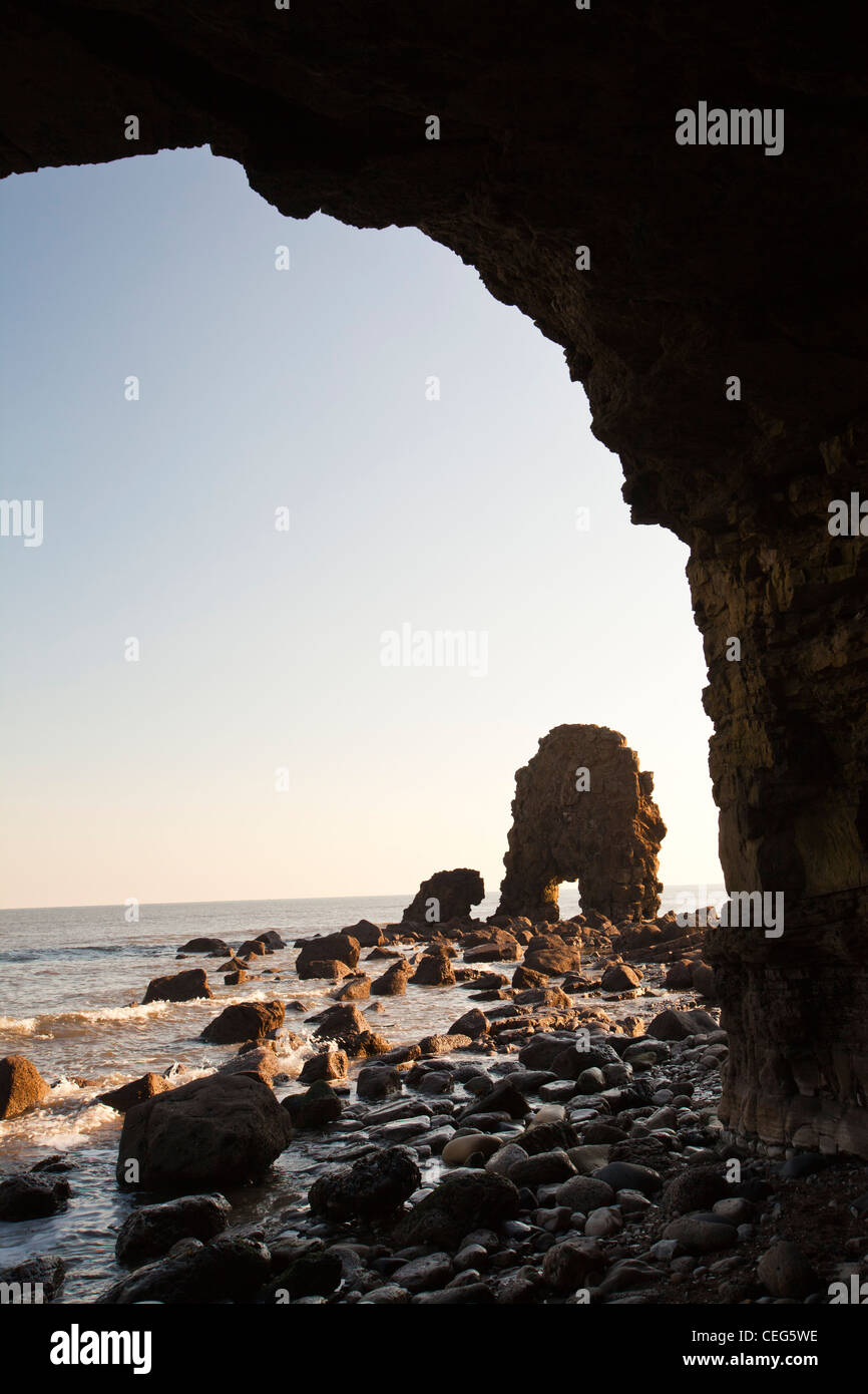 Sea stacks and sea arch on the North East coast at Whitburn between ...