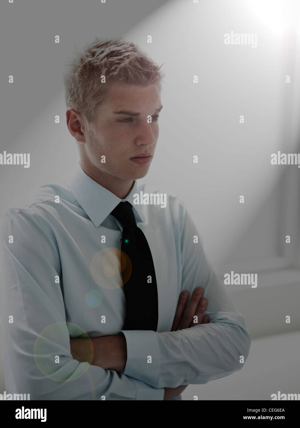 young man looking off camera Stock Photo - Alamy