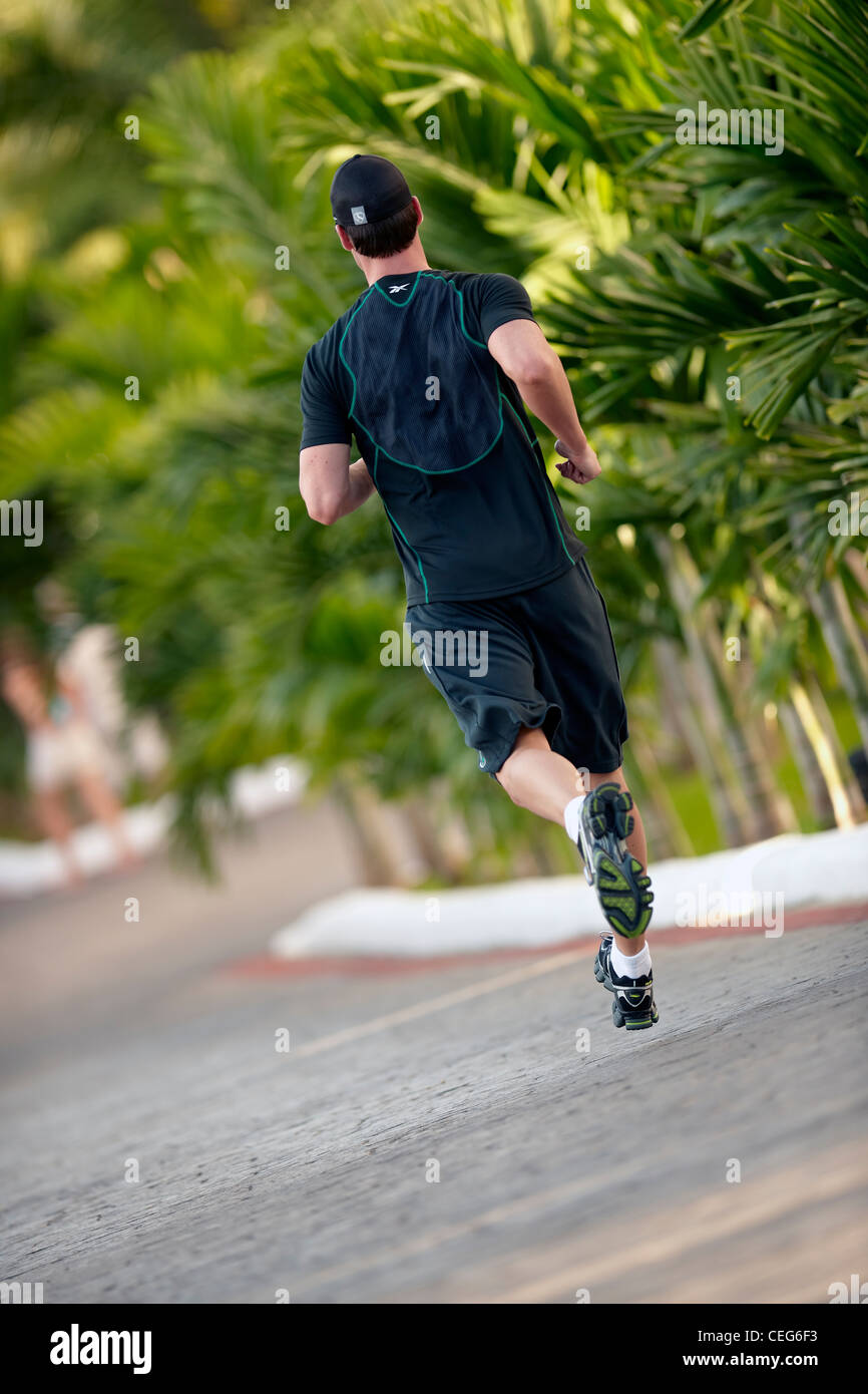Man running from behind hi-res stock photography and images - Alamy