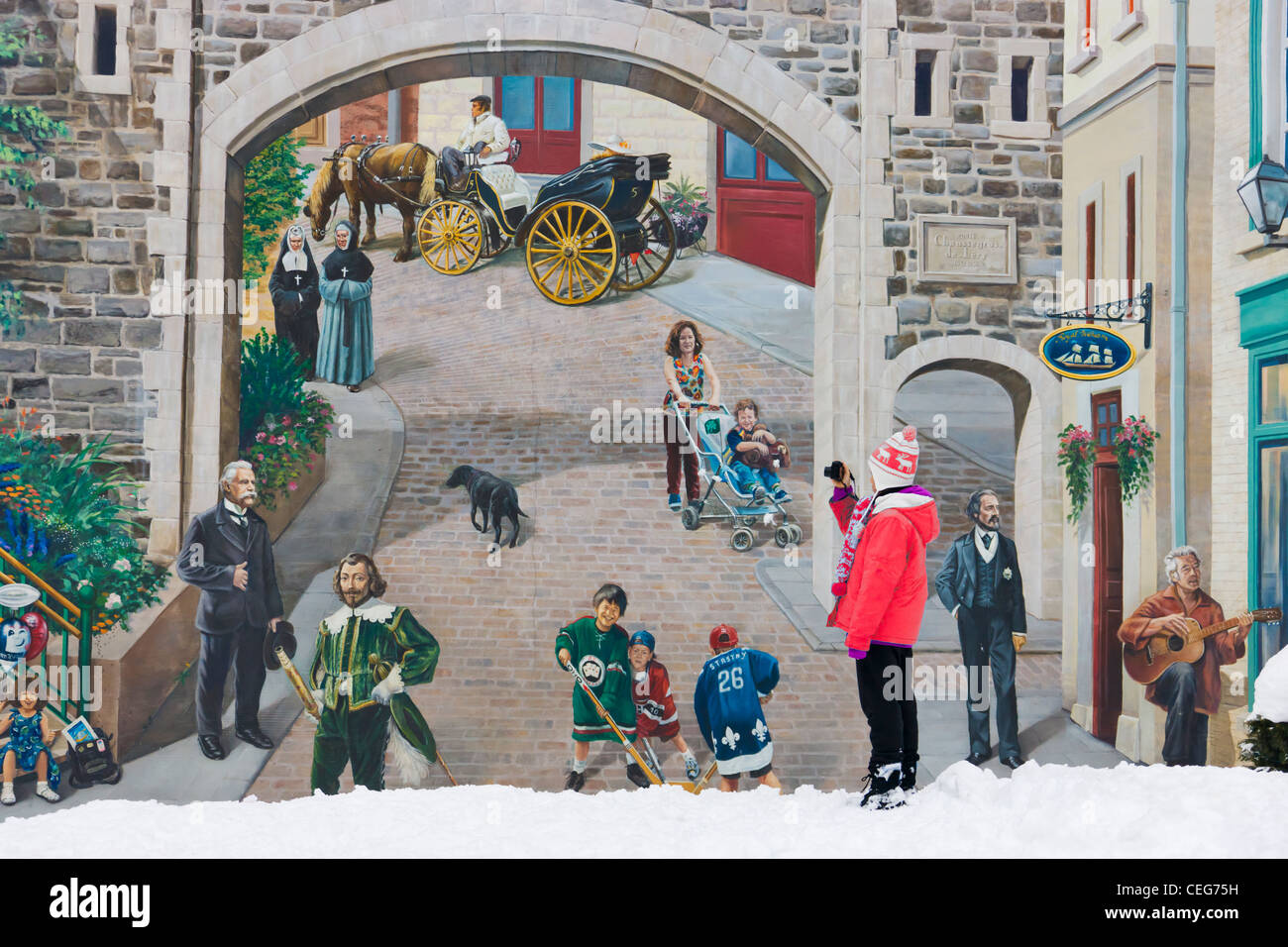 Girl photographing mural in old town, Quebec City (UNESCO World ...