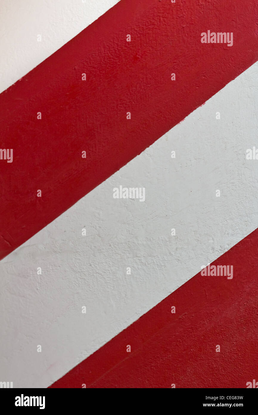 A red and white striped wall in the center of Madrid Stock Photo - Alamy
