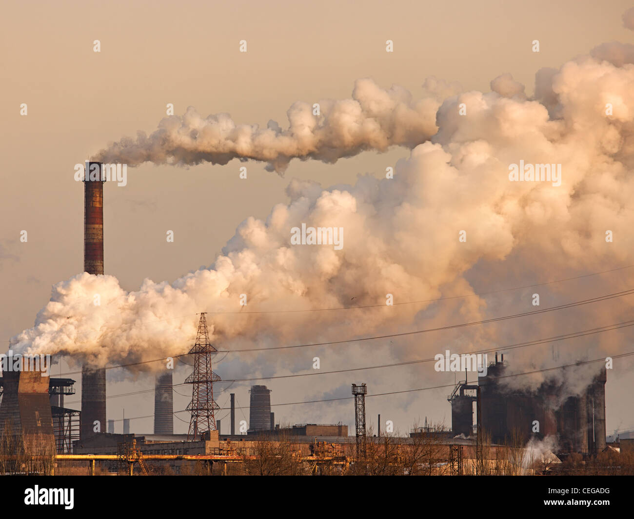 Chemical factory with smoke stack Stock Photo - Alamy