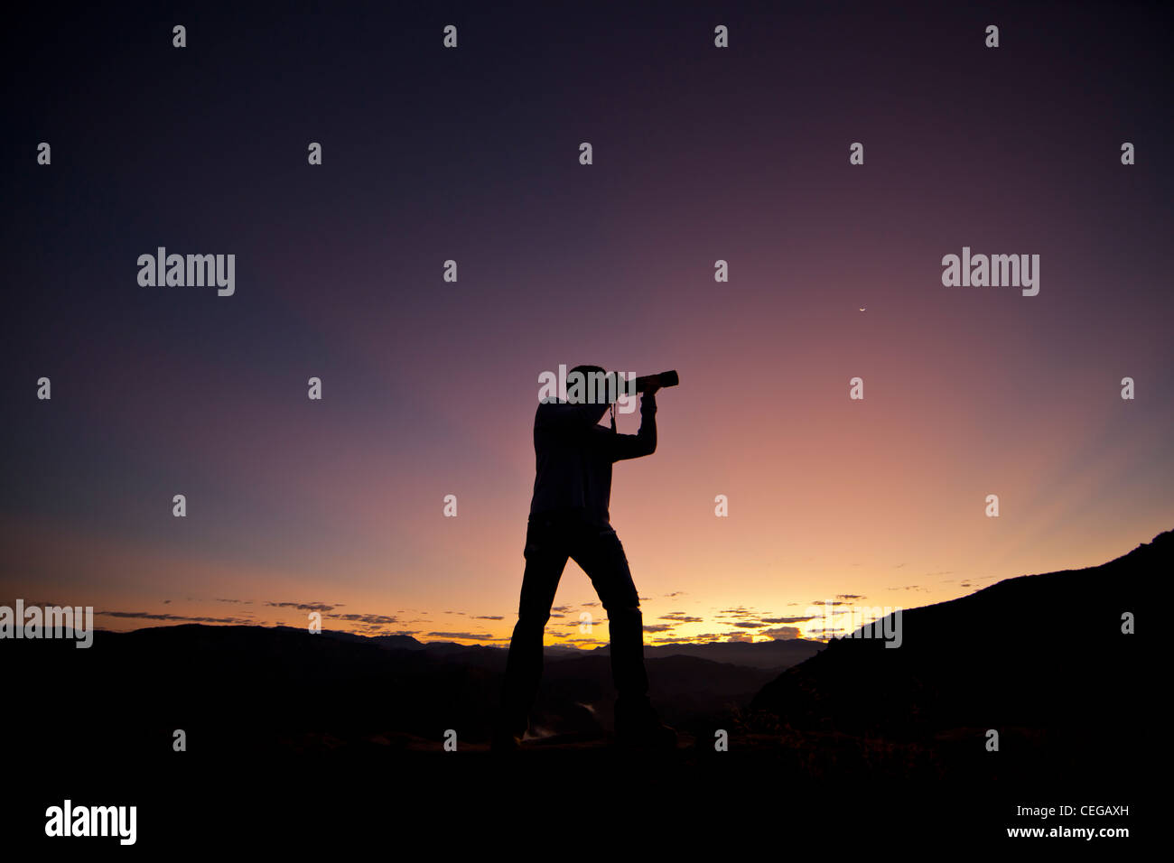 Man looking at moon hi-res stock photography and images - Alamy