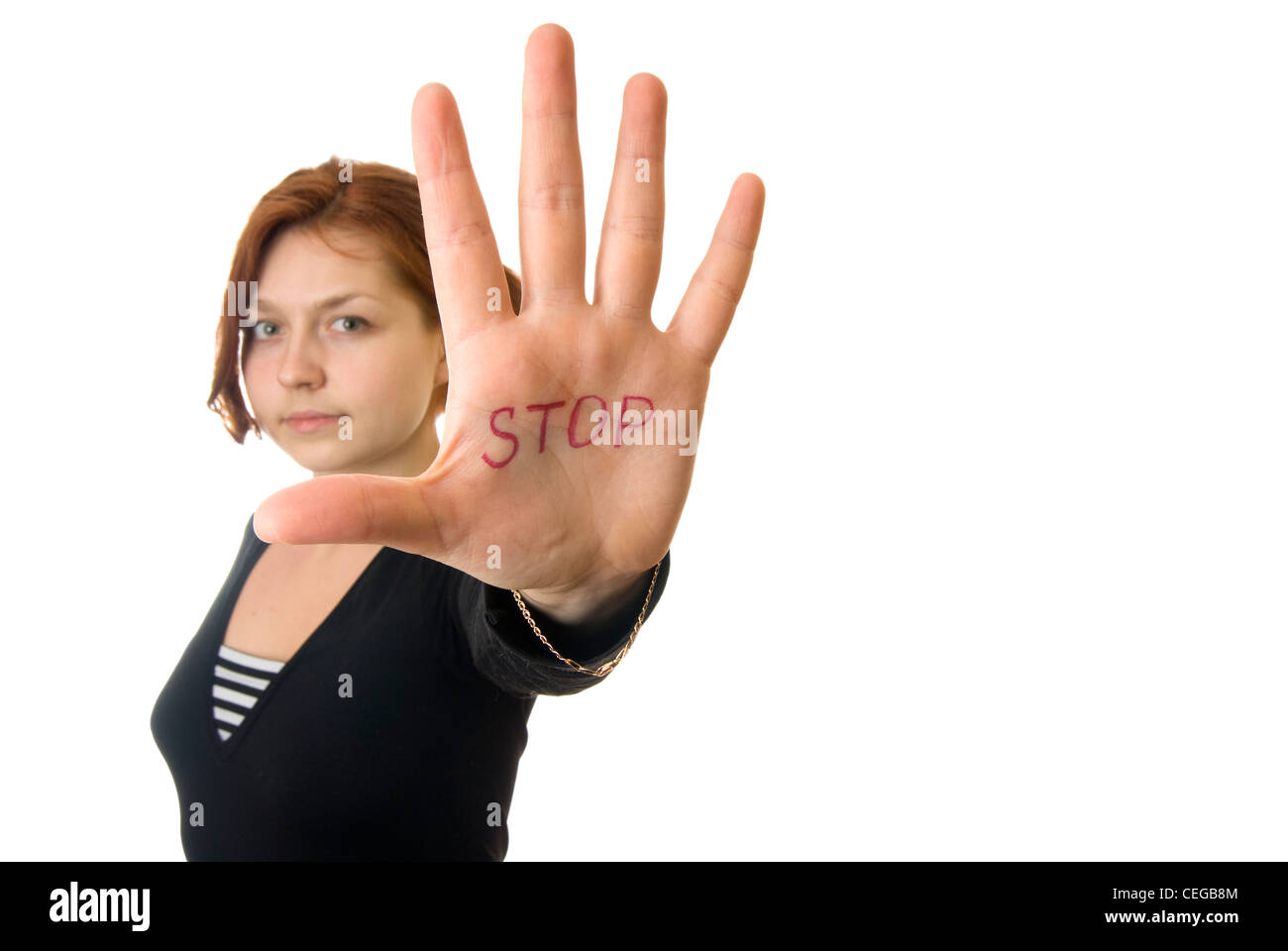 Girl showing "Stop!" gesture with her hand Stock Photo - Alamy