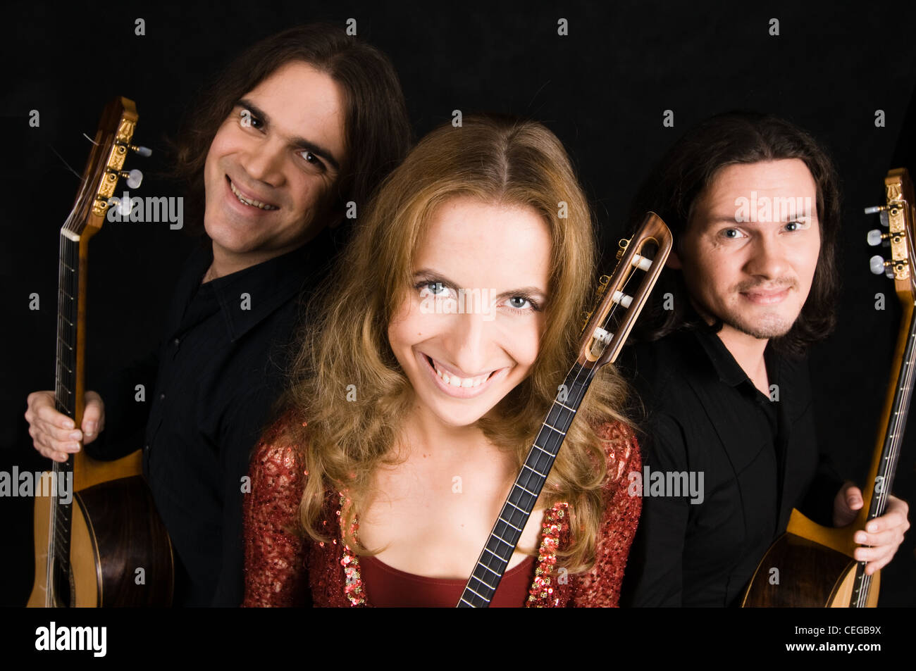 Three flamenco artists performing spanish national music Stock Photo ...