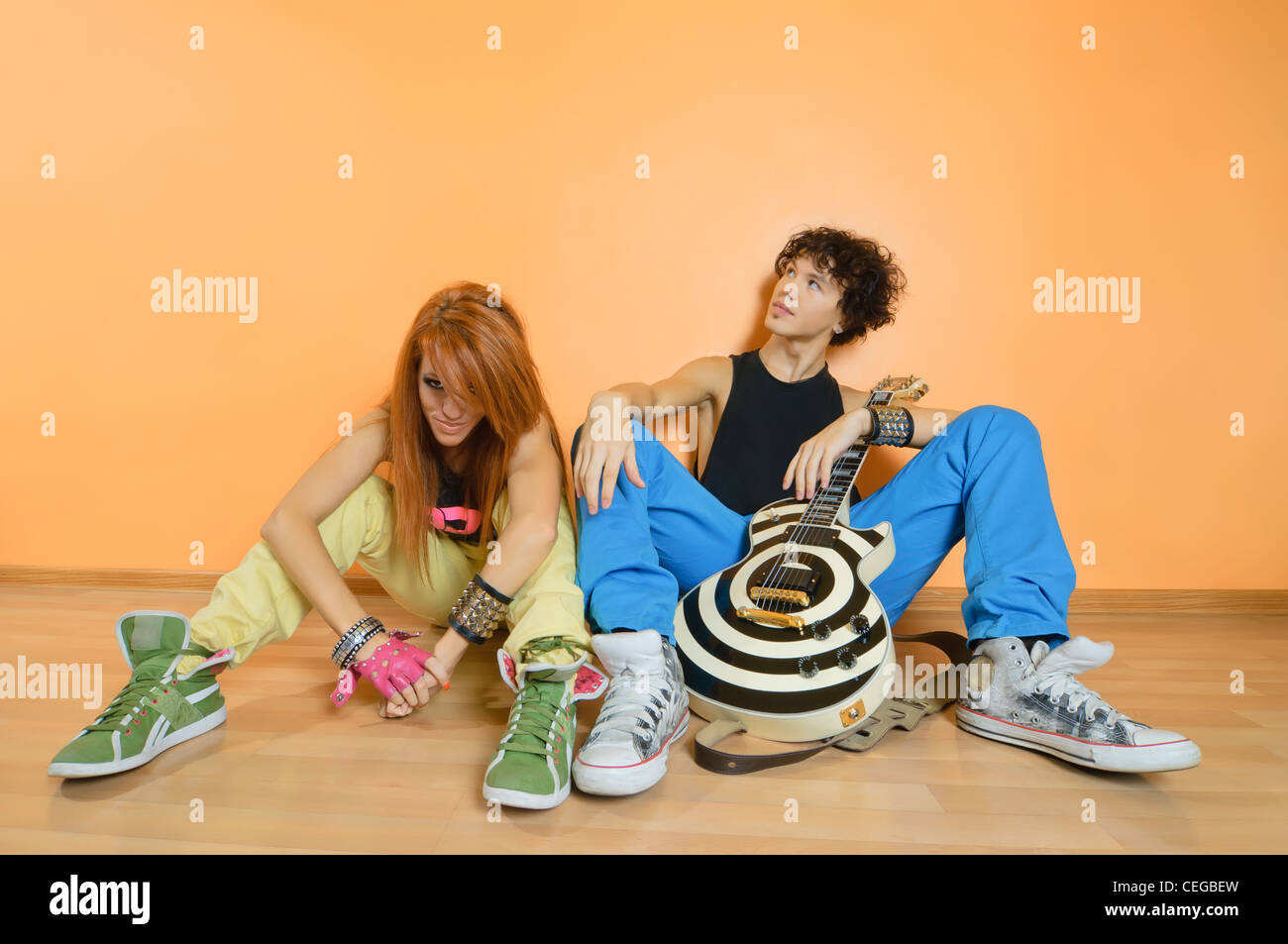 Two rock band members relaxing at the studio Stock Photo - Alamy