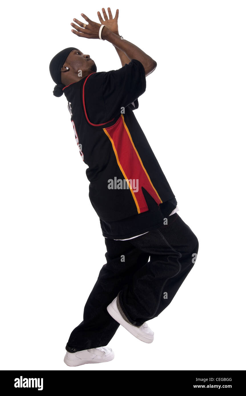 Cool young hip-hop dancer on white background Stock Photo - Alamy