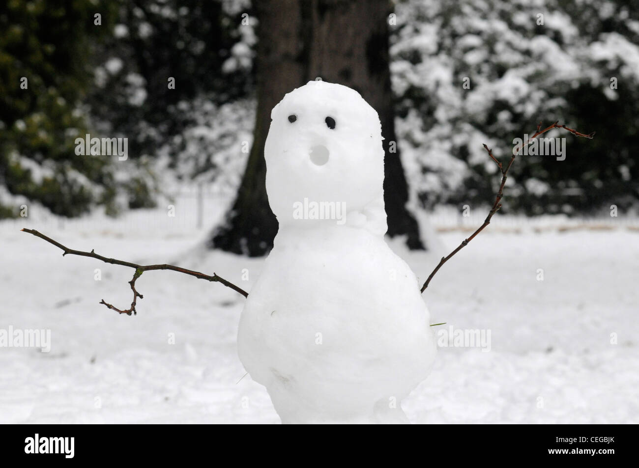 Snowman built in Hyde Park in the snow - Royal Park in London, England ...