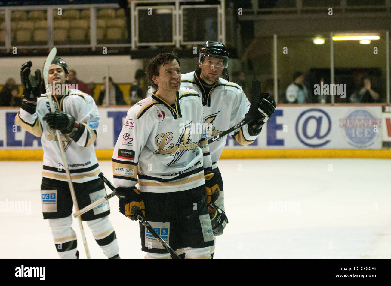 Ice hockey players celebrate win Stock Photo - Alamy