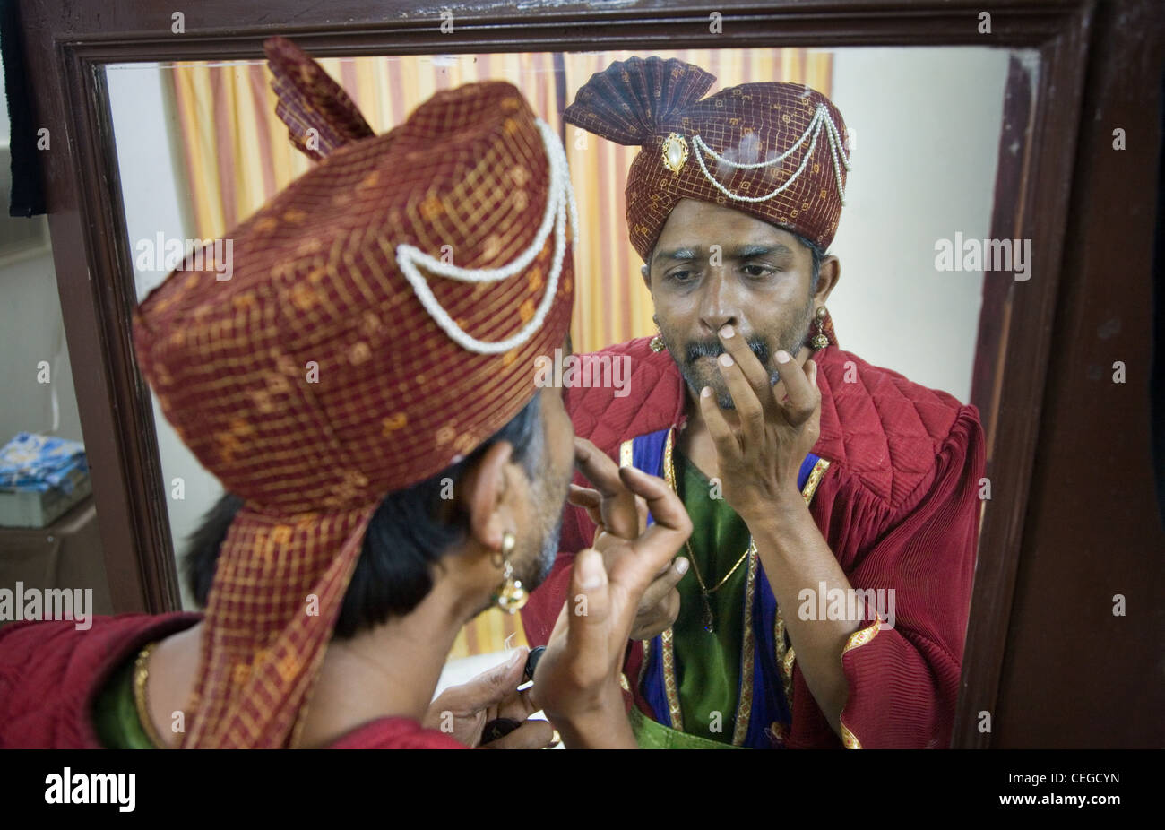 Actor doing makeup for a Koothu-P-Pattarai play in Chennai, India Stock ...
