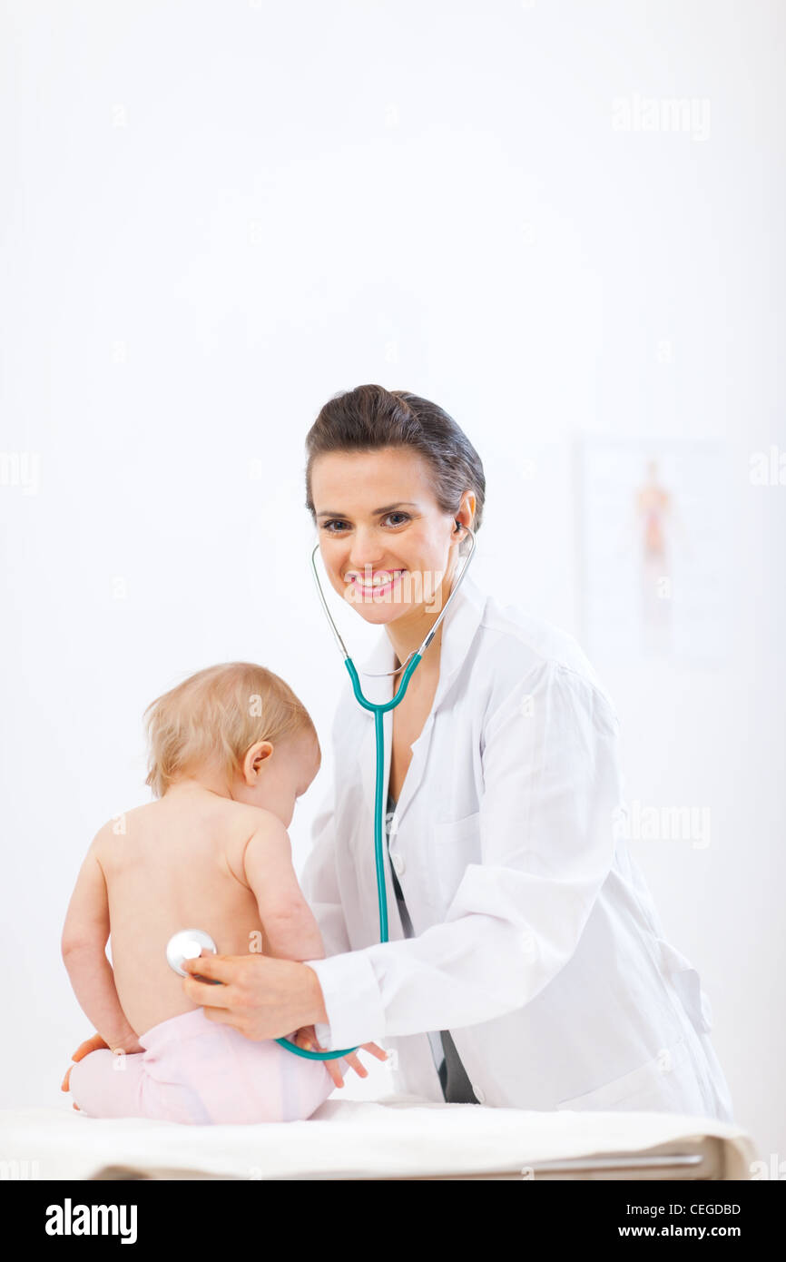 Pediatrician doctor examine baby using stethoscope Stock Photo - Alamy
