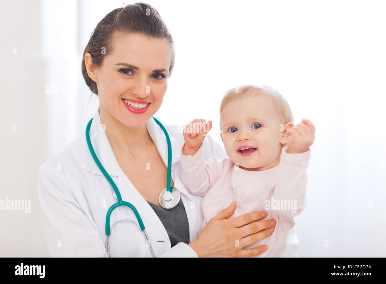 Portrait of pediatrician doctor with smiling baby Stock Photo - Alamy