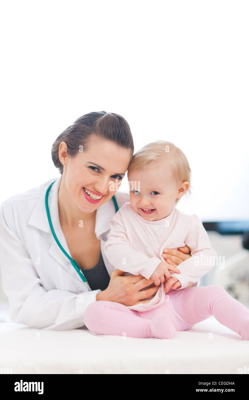Portrait of laughing pediatrician doctor and baby Stock Photo - Alamy