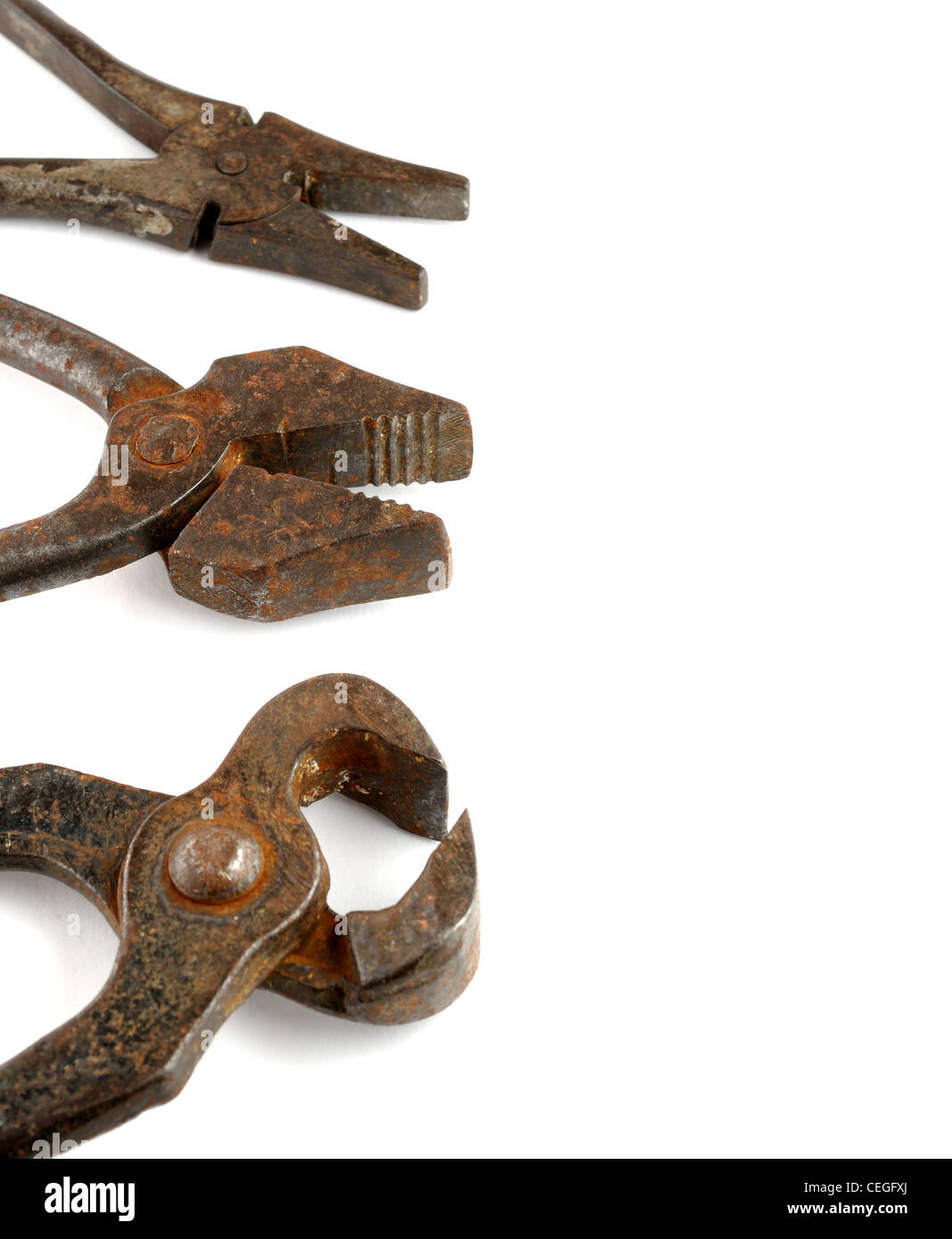 Old rusty tools isolated on white background Stock Photo - Alamy