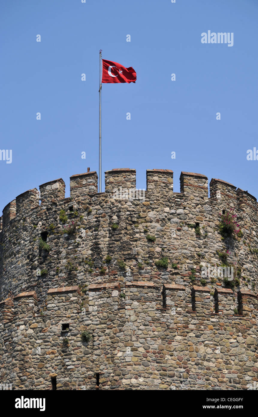 Turkey Istanbul. A castle turret looks out over the Bosphorus and a ...