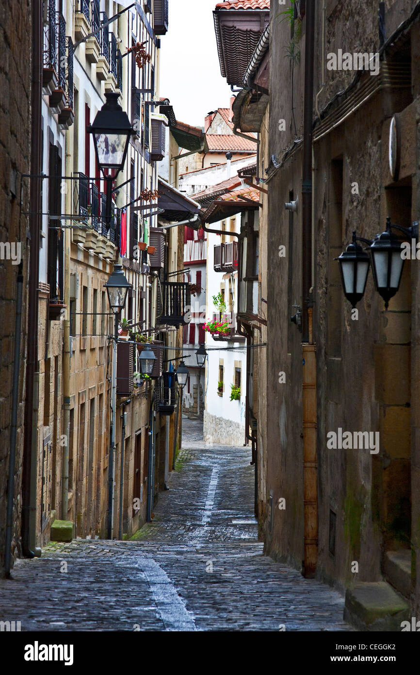 Street scene in Hondarribbia, Spain, with narrow stone paved streets ...
