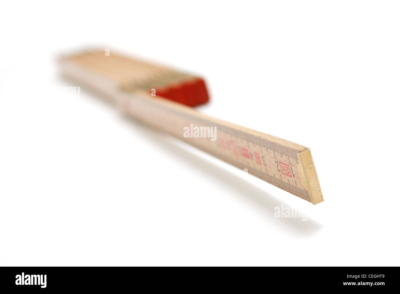 Wooden ruler isolated on white Stock Photo - Alamy