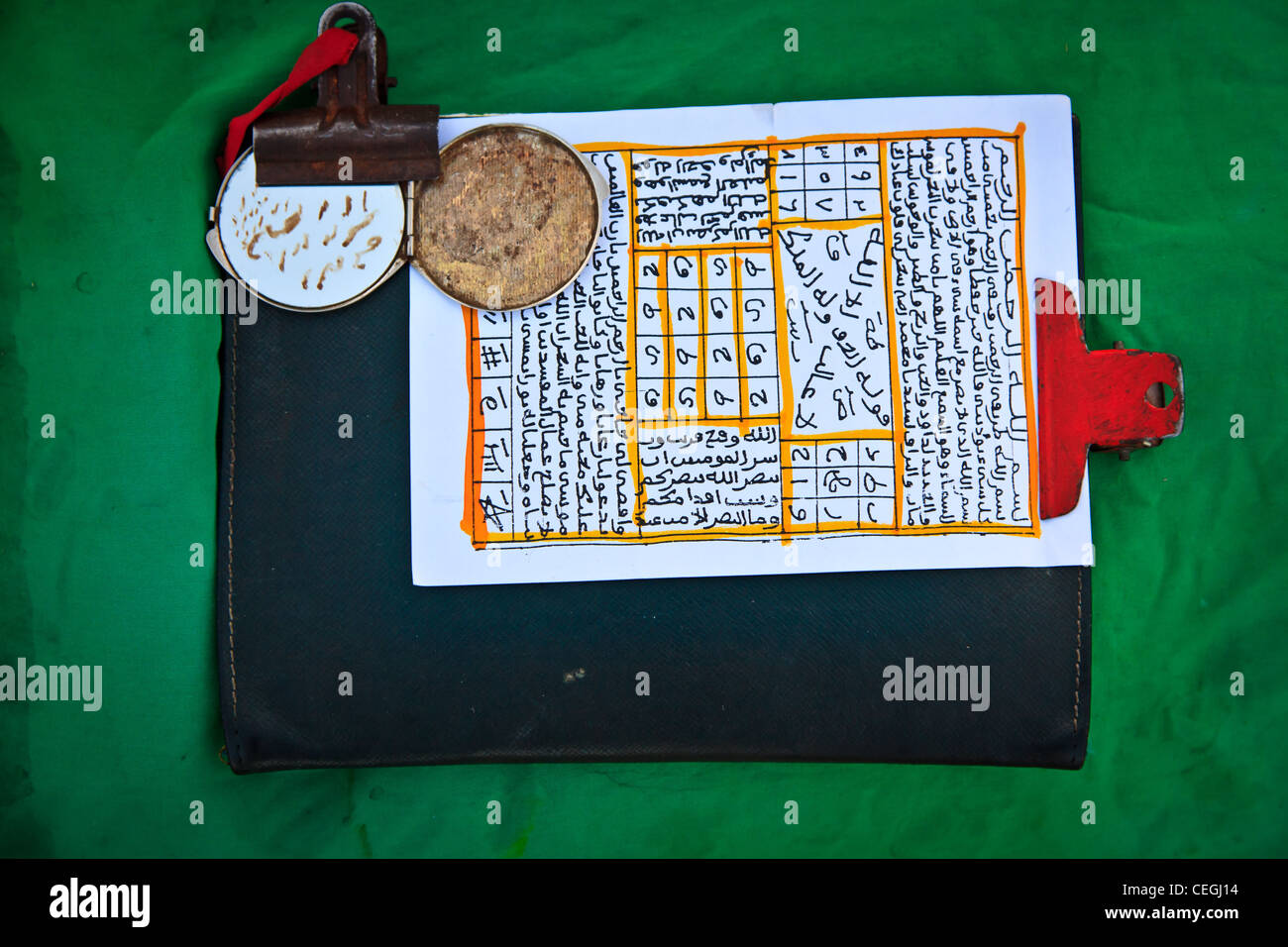 Arabic text on a green background, Morocco Stock Photo - Alamy