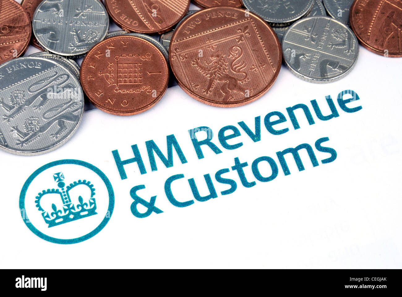 A HM Revenue & Customs Tax Return form and coins Stock Photo - Alamy