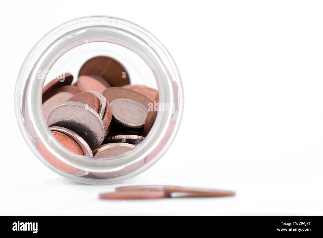 Savings Jar of British Coins Stock Photo - Alamy