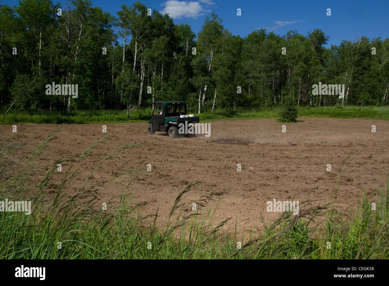 Preparing a food plot for wildlife Stock Photo - Alamy