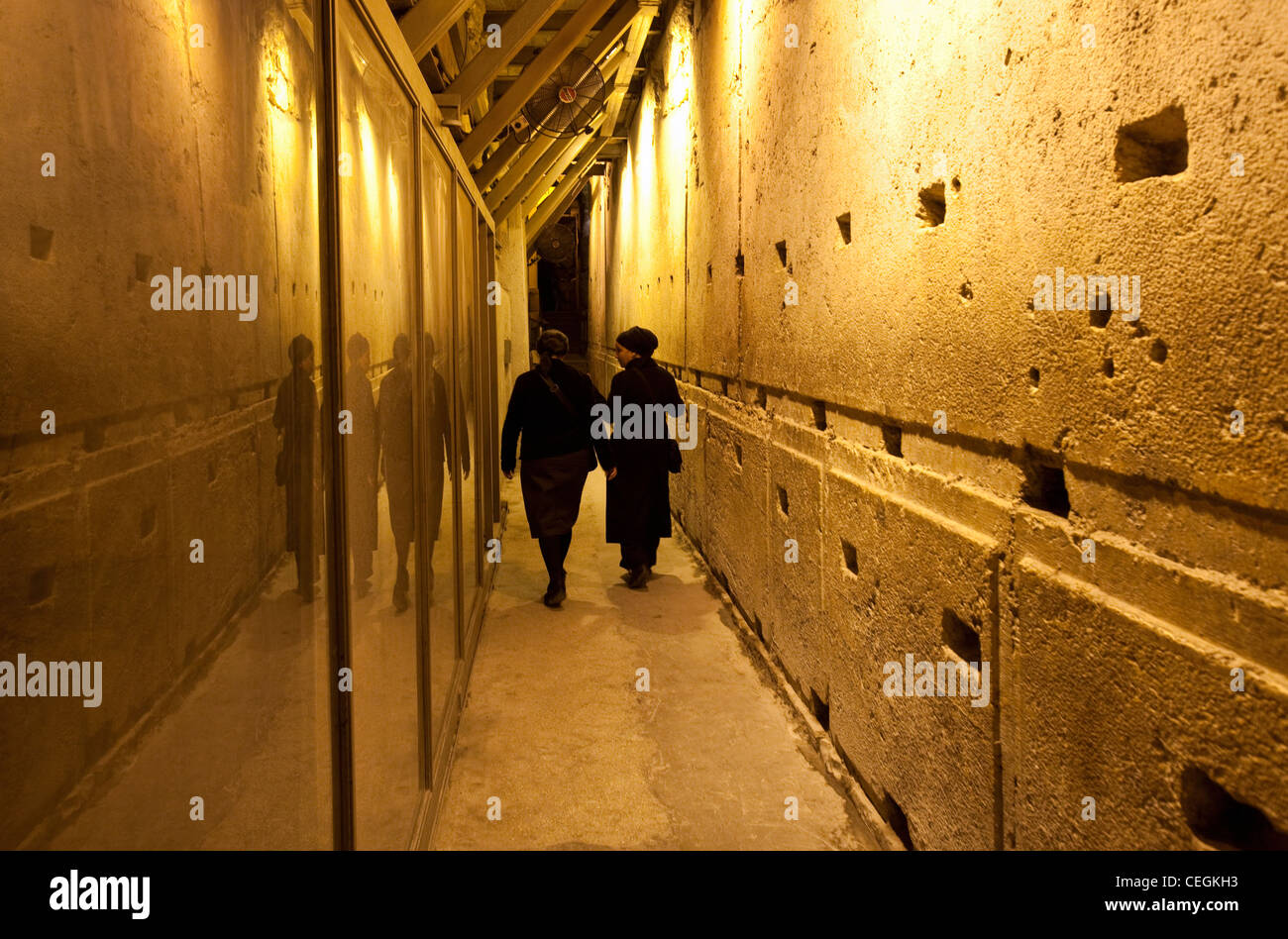 Religious Jewish women walk along walking along the 517-tonne ...