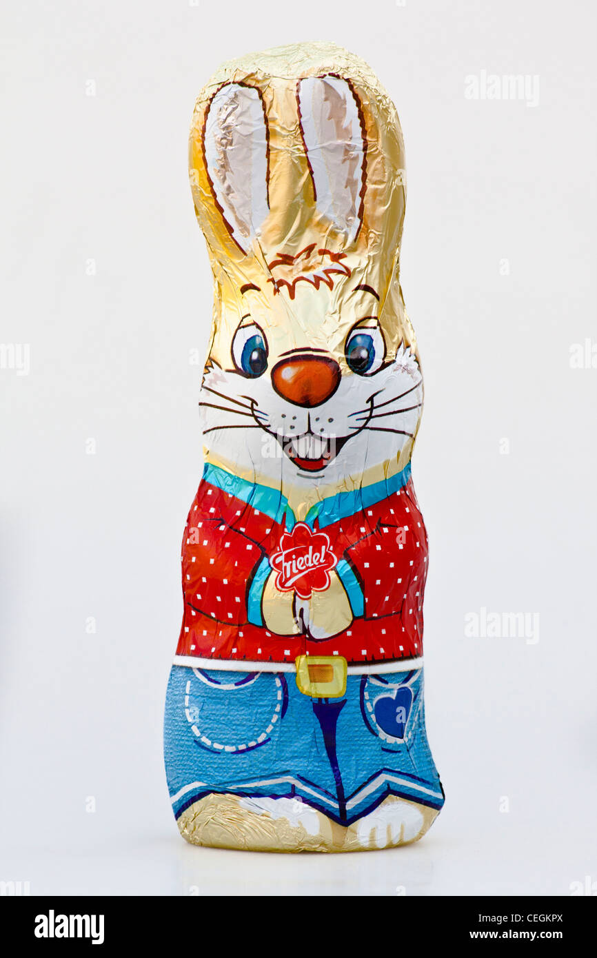 Easter chocolate Bunny colorful wrapped one sweets isolated cutout cut out on white table ...