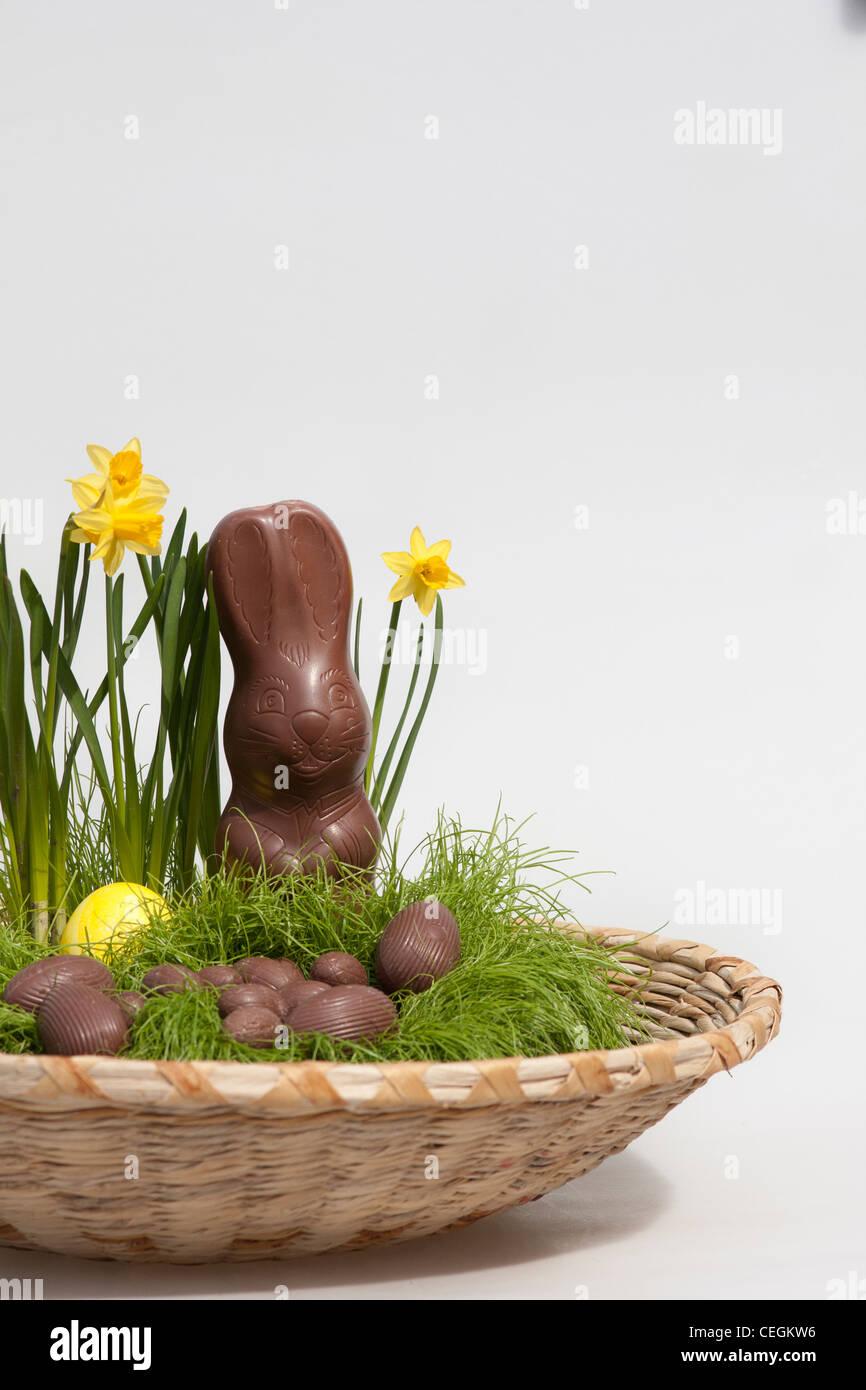 Easter traditional chocolate Bunny and eggs in a full basket one sweets ...