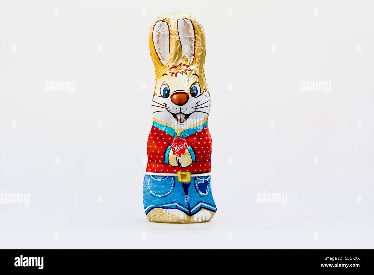 Easter chocolate Bunny colorful wrapped isolated cutout cut out on a white table background ...