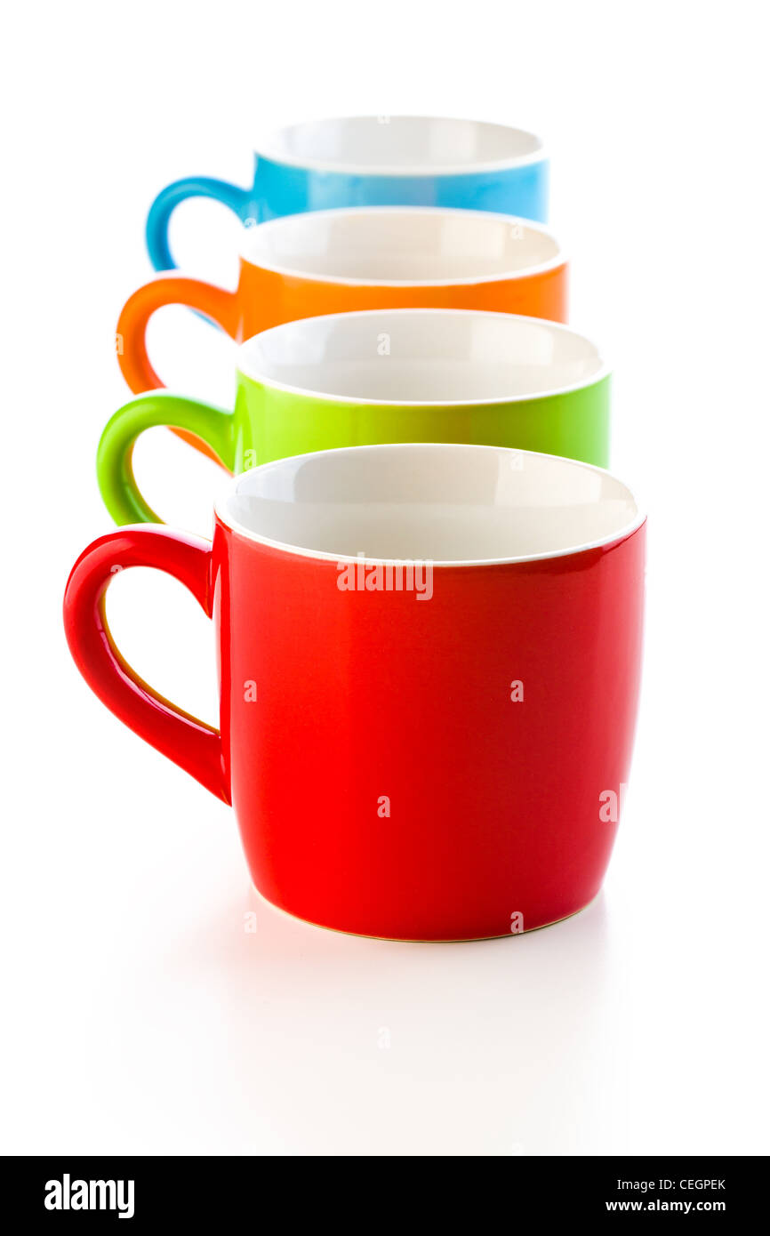 colorful ceramic mugs on white background Stock Photo - Alamy