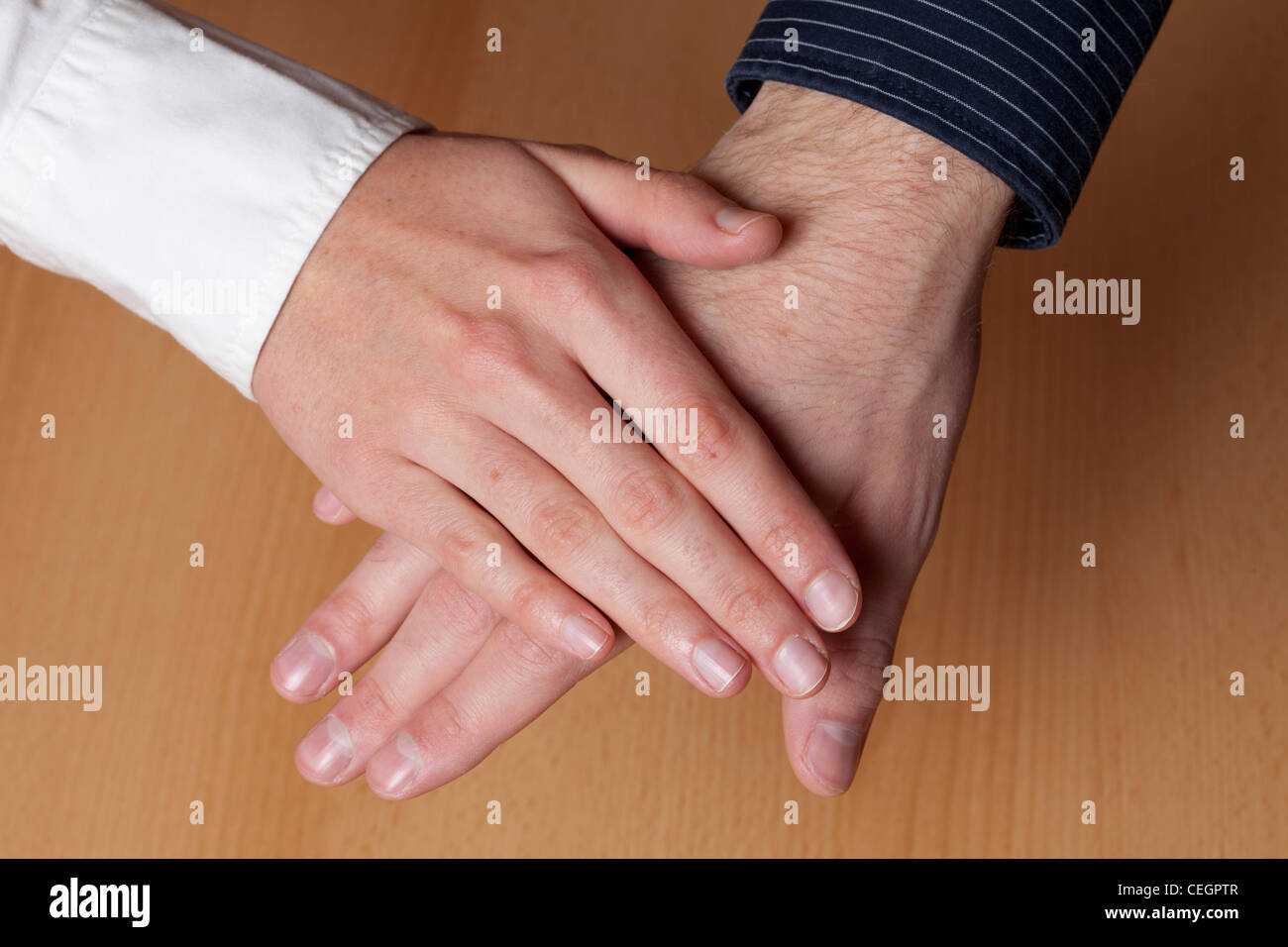 Hand in hand, young people Stock Photo - Alamy