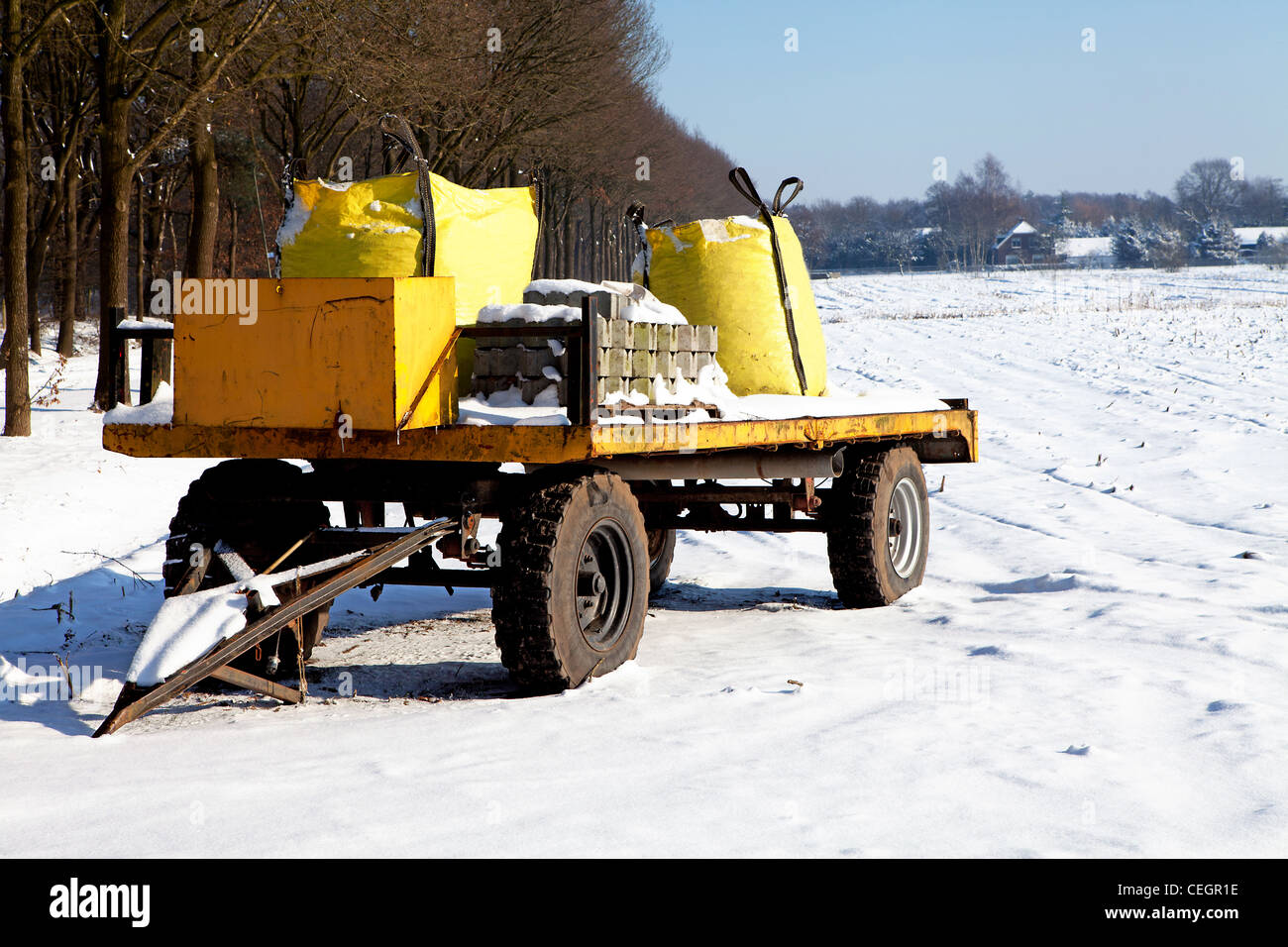 Loaded farm wagon in Dutch winter landscape Stock Photo - Alamy