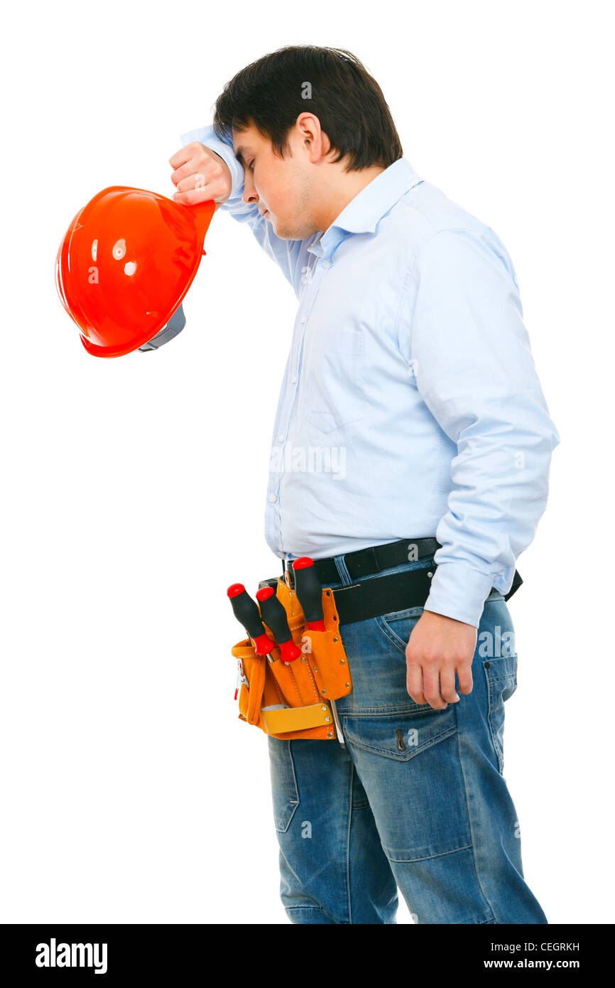 Tired construction worker Stock Photo - Alamy